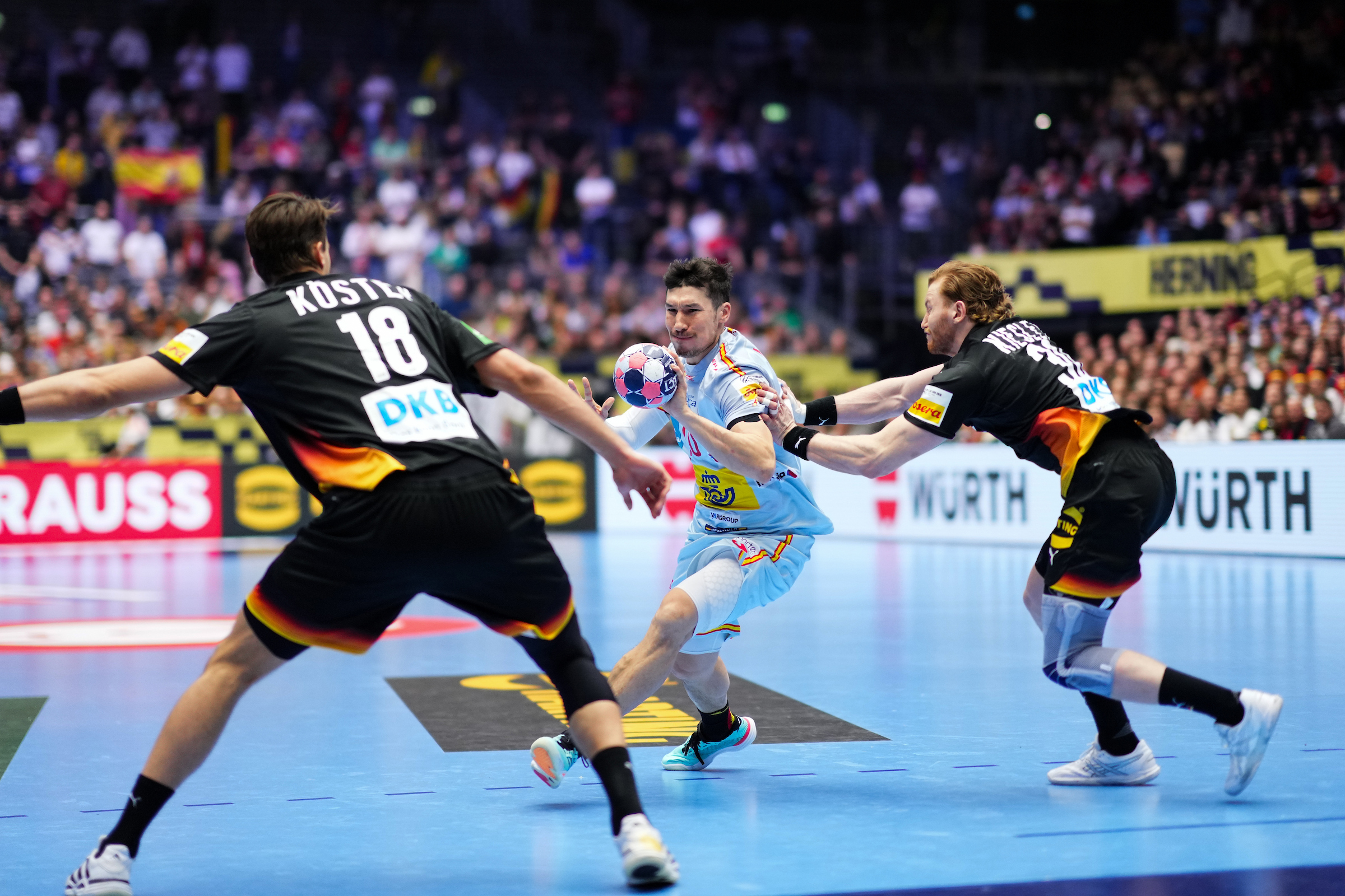 Germany join Spain in the main round after a spectacular battle
