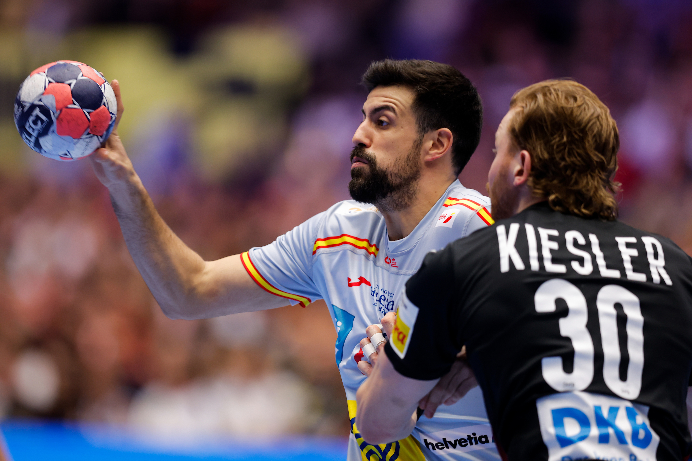 Germany join Spain in the main round after a spectacular battle